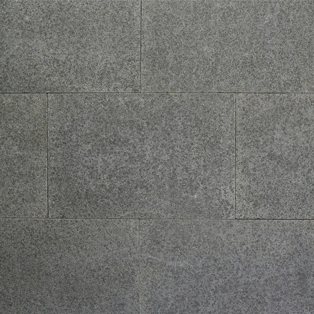 Artisan Exterior | Raven Granite Pavers, Tiles & Coping