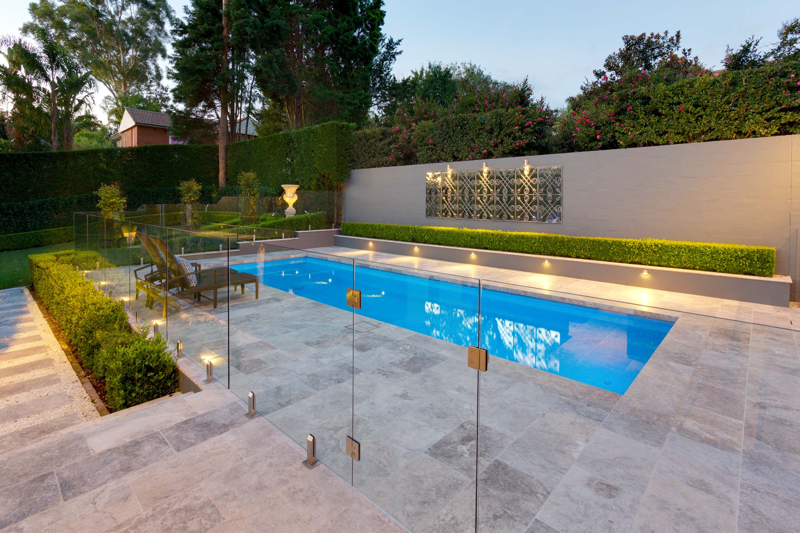 Artisan Exterior | Premium Silver Travertine Pavers & Coping