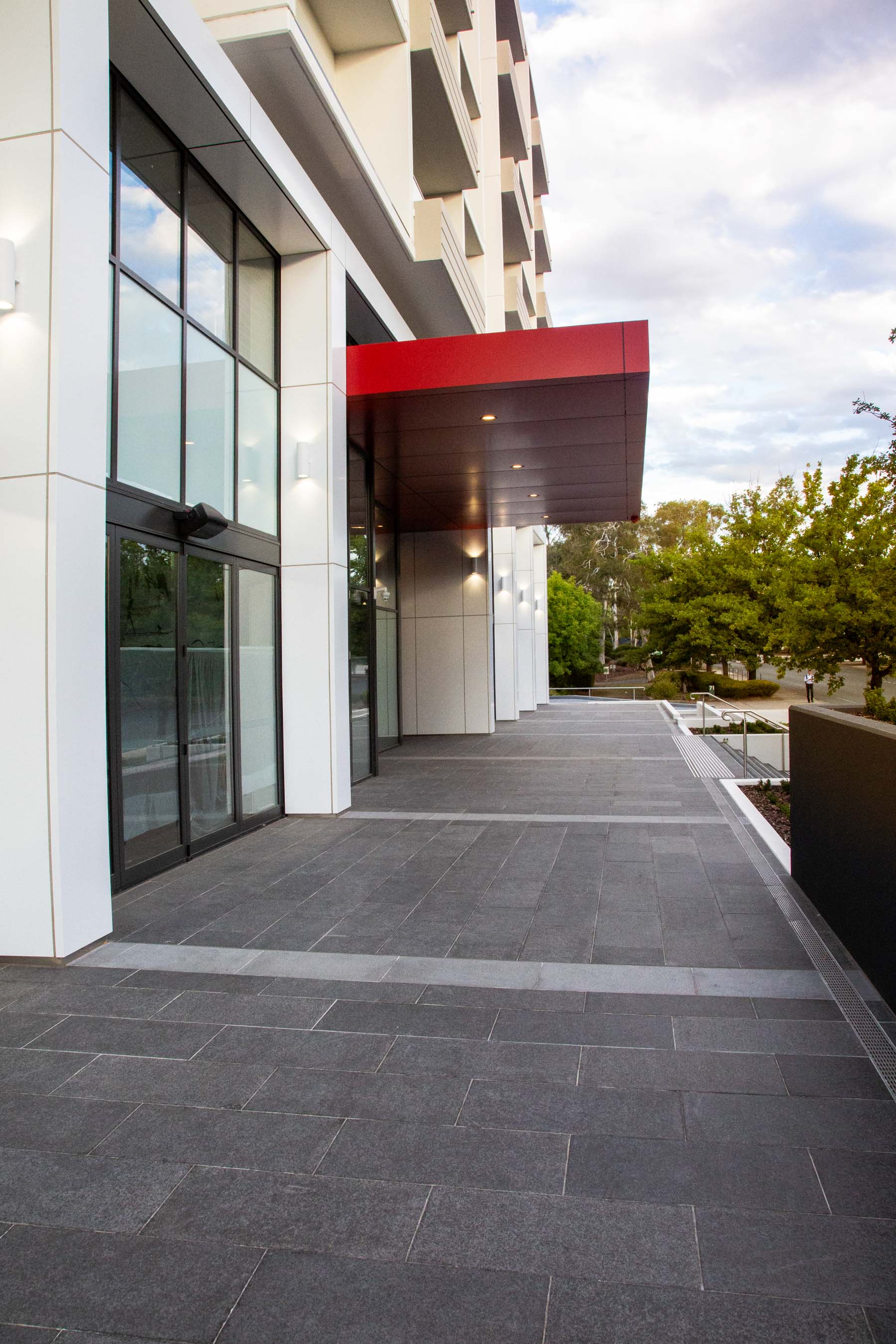 Artisan Exterior | Raven Granite Pavers, Tiles & Coping