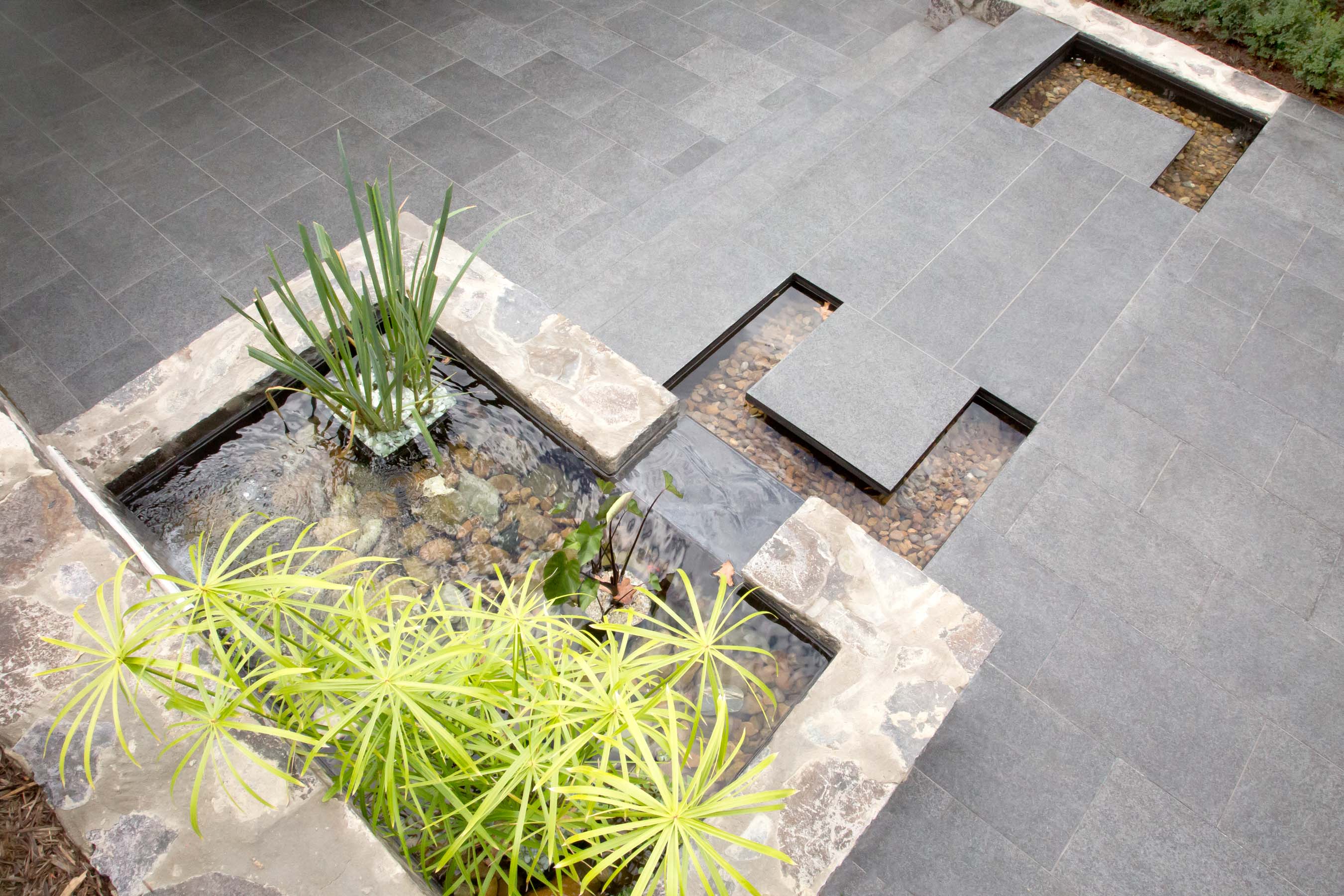 Artisan Exterior | Raven Granite Pavers, Tiles & Coping